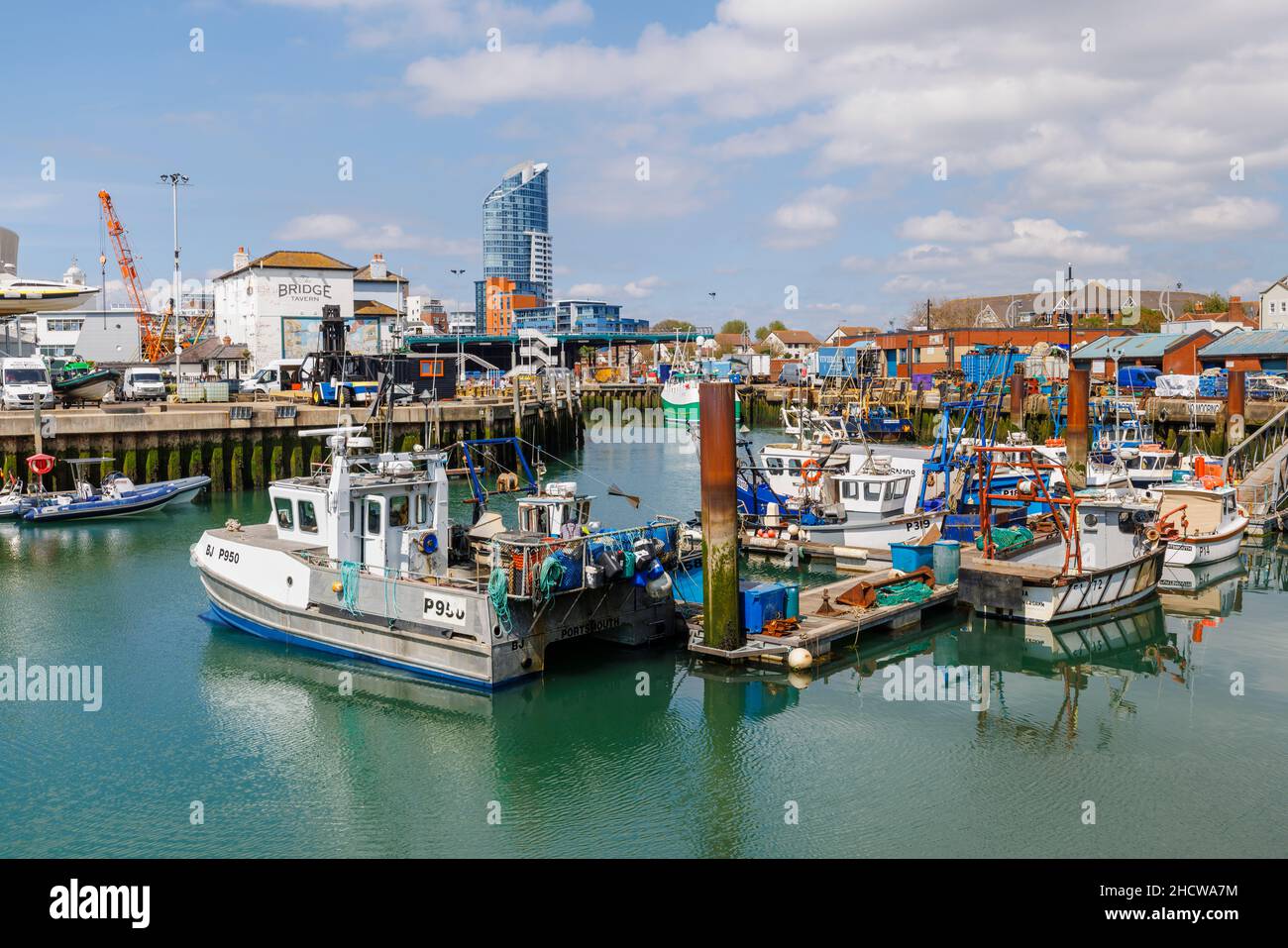 Fishing boats moored in Camber Quay in Portsmouth Harbour, Hampshire ...