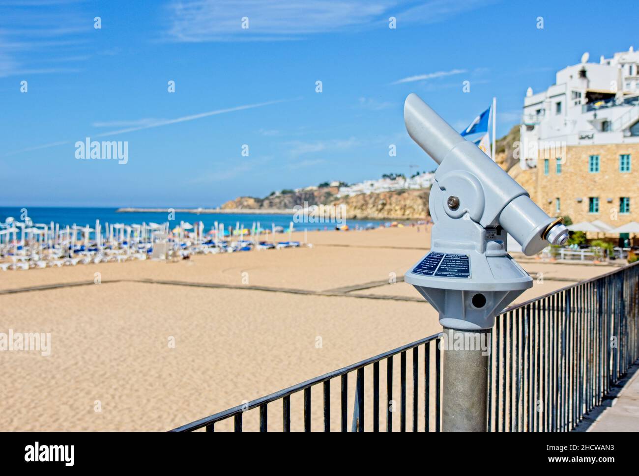 A telescope overlooking the beach in Albufeira Stock Photo - Alamy