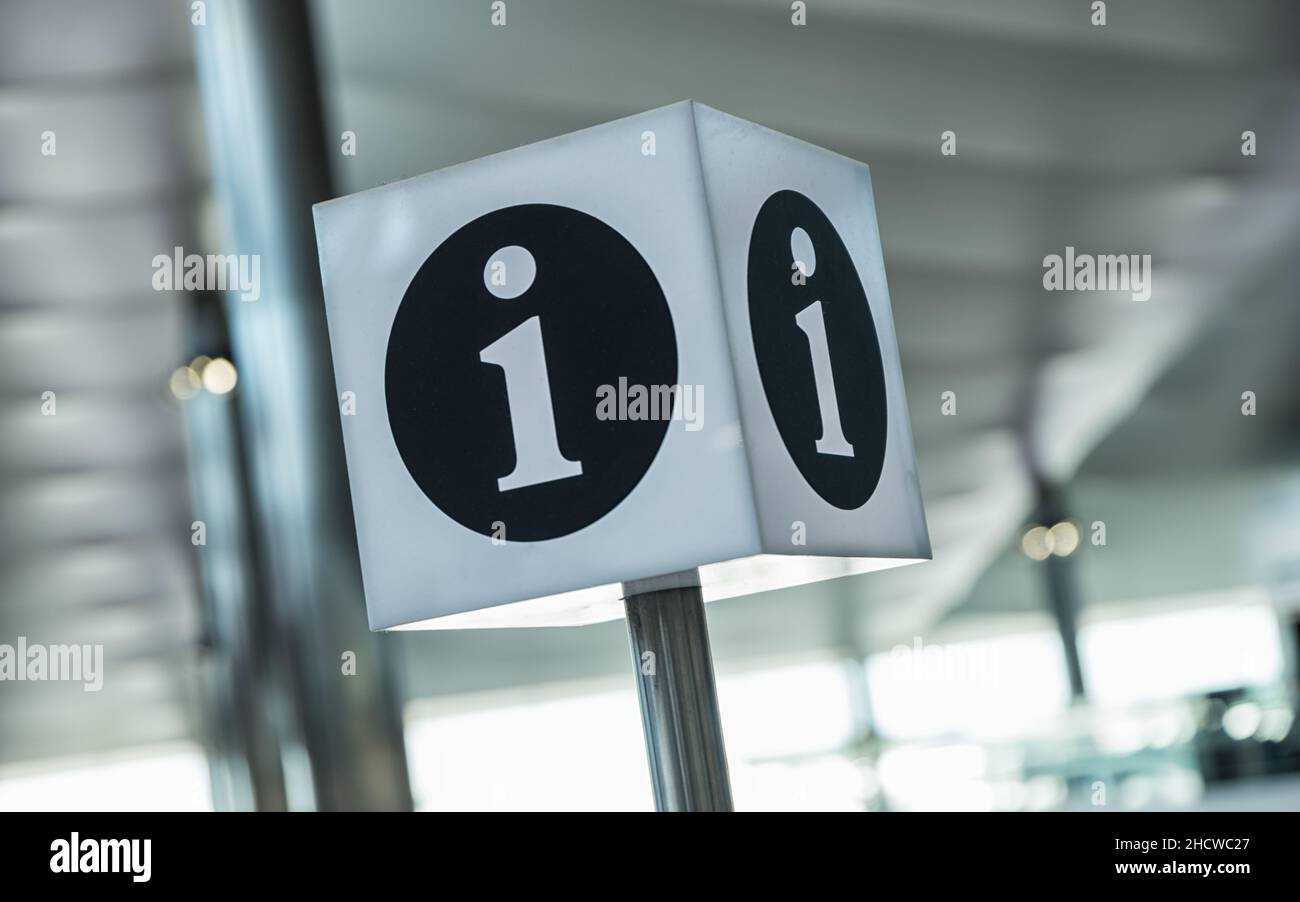info point symbol on a airport Stock Photo - Alamy