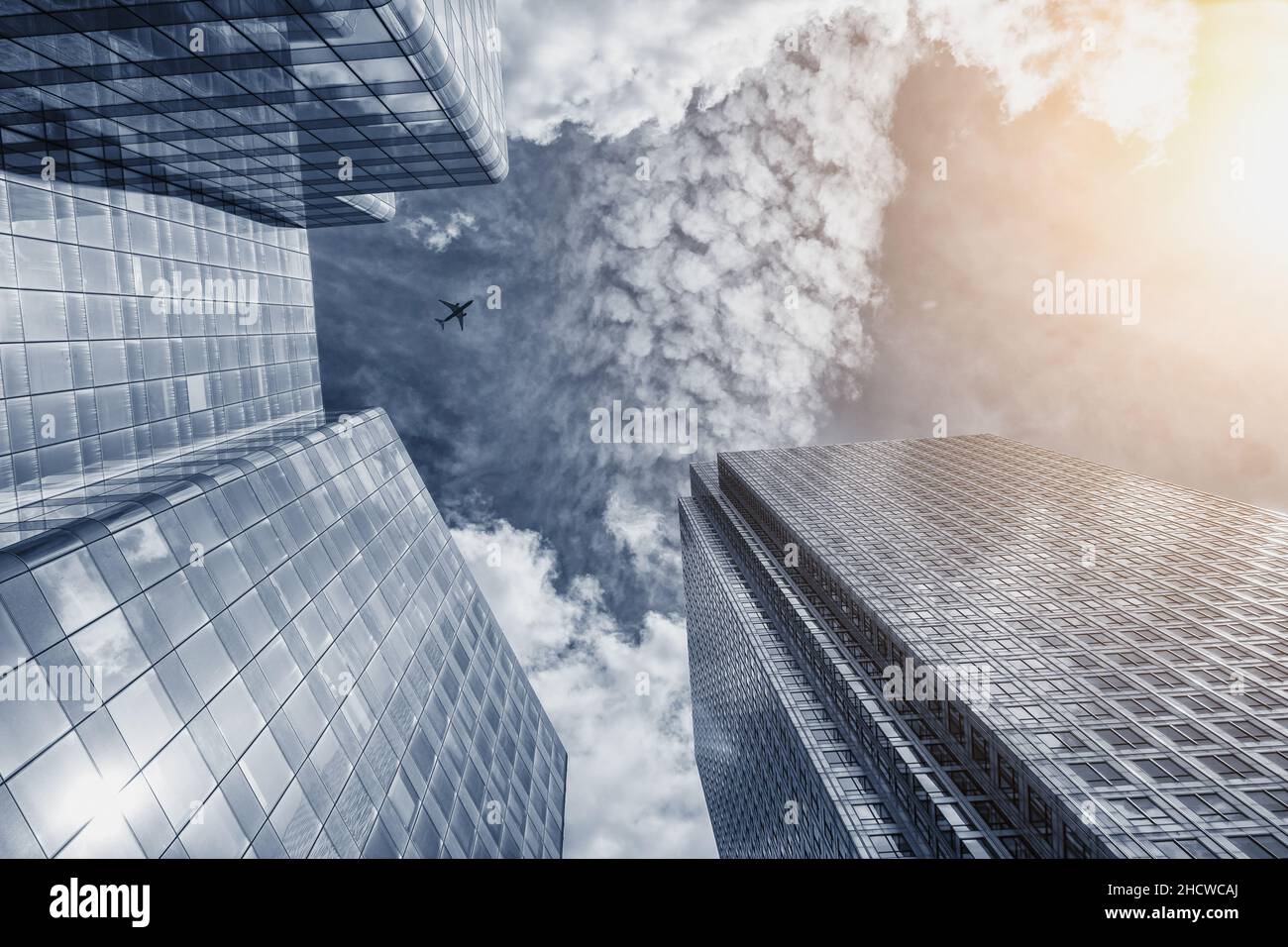 Airplane flying over high buildings hi-res stock photography and images ...