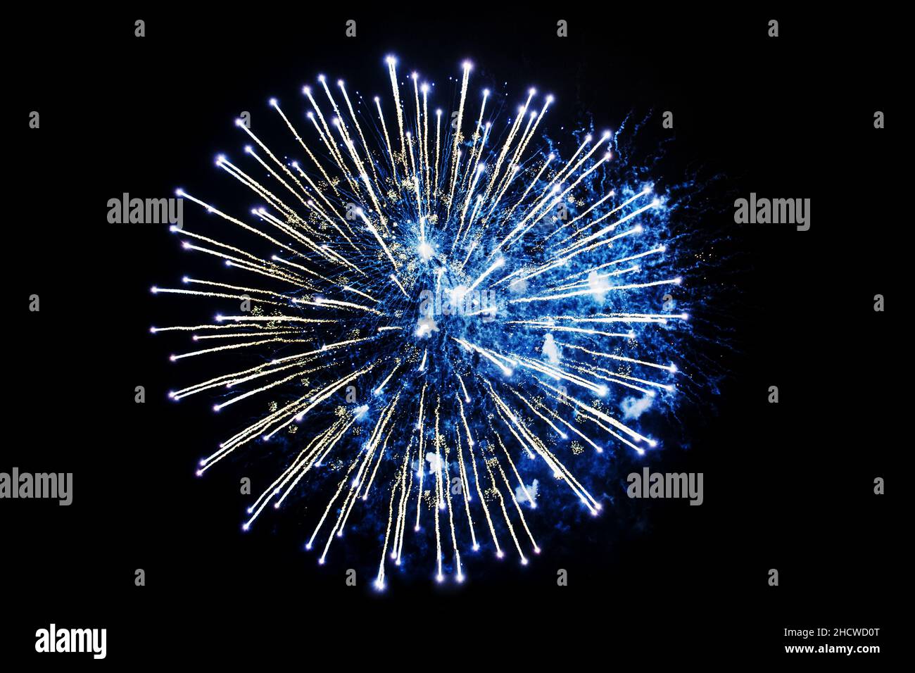 blue fireworks on a black background. Festive Christmas lighting ...