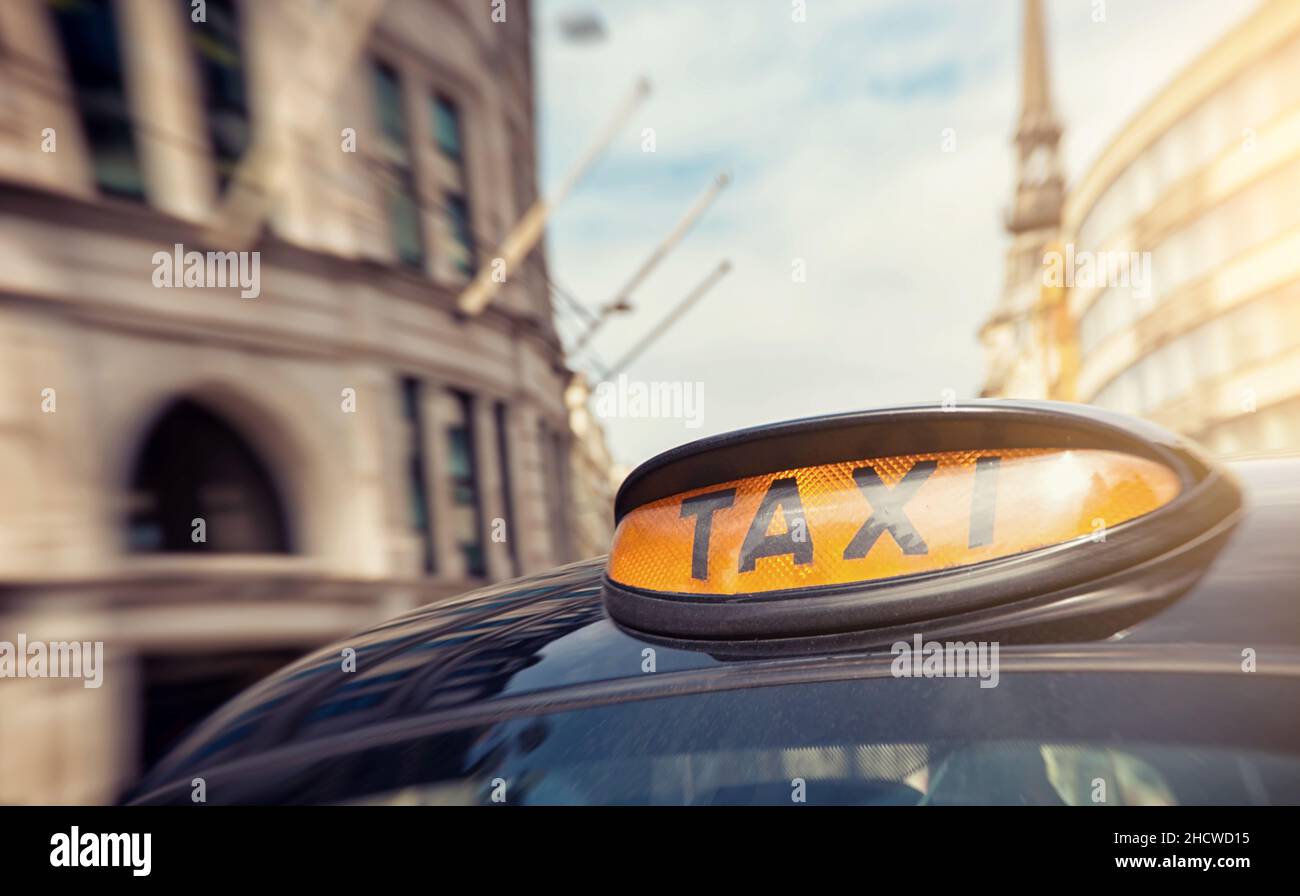 London black taxi cab sign on the street, UK Stock Photo - Alamy
