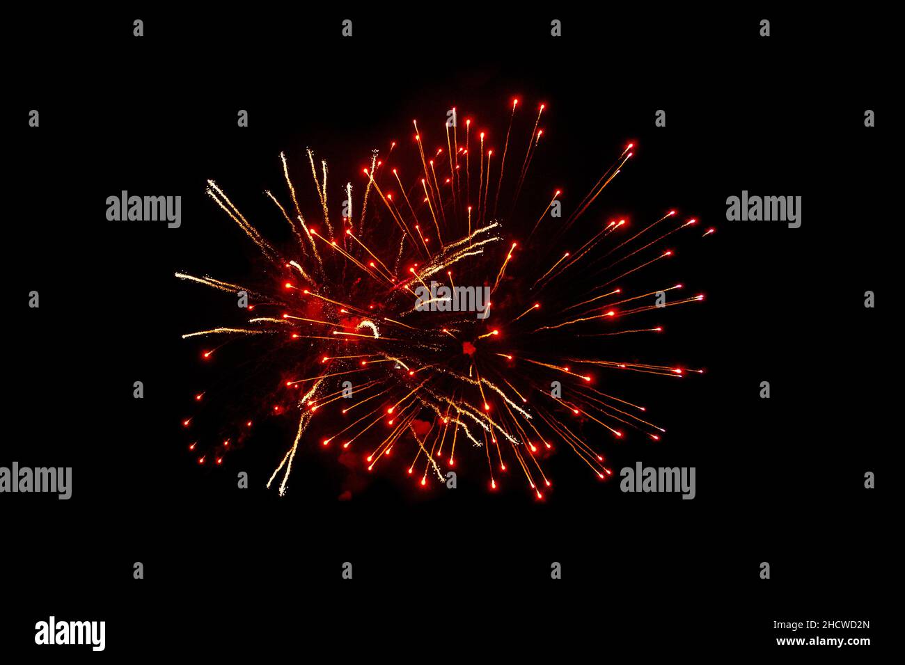 Red fireworks on a black background. Festive Christmas lighting element ...