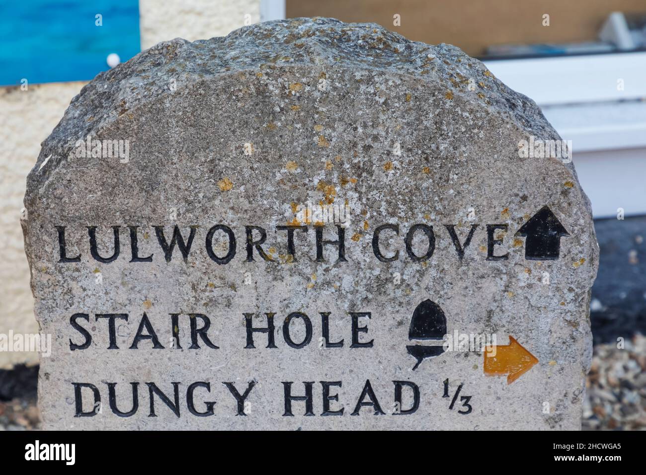 Lulworth cove route marker direction stone hi-res stock photography and ...