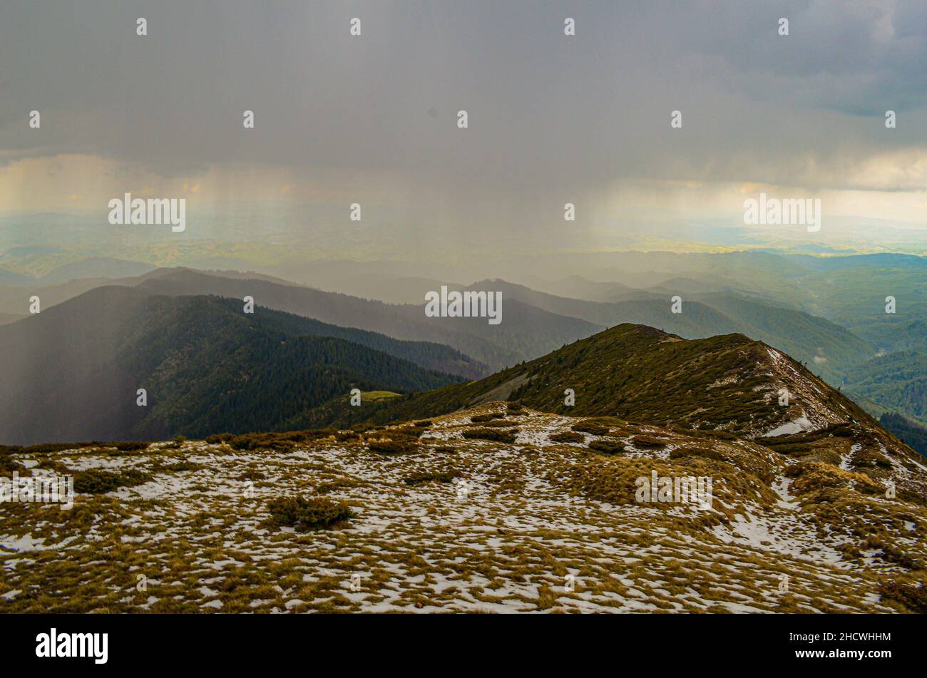 Panorama view with gathering autumnal storm clouds and the first signs ...