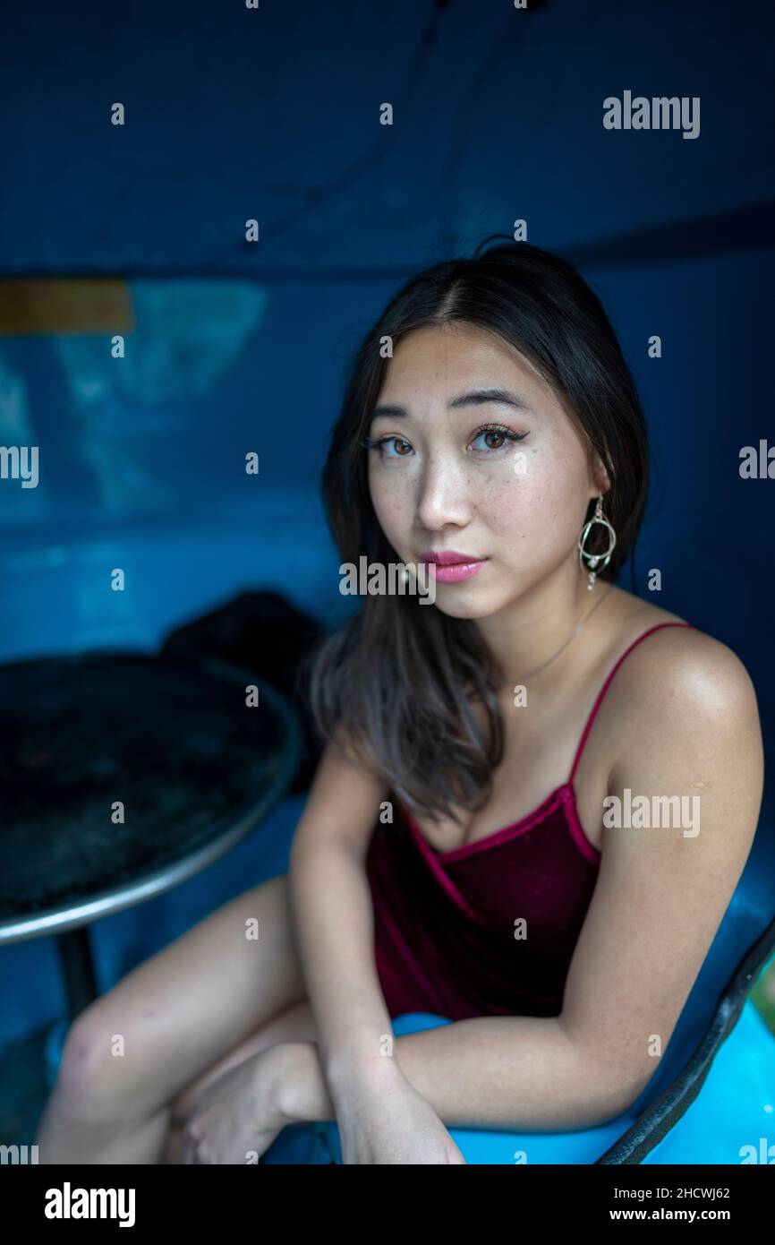 Young Asian Woman Sitting Inside a Bear Shaped Carnival Ride Stock ...