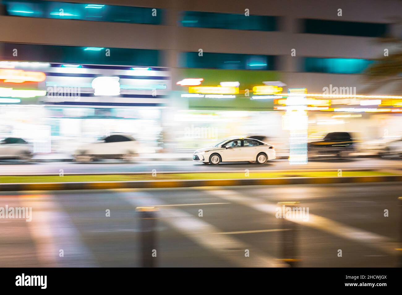 Speeding Taxi Car Fast Driving In City Street. Motion Blur Background ...