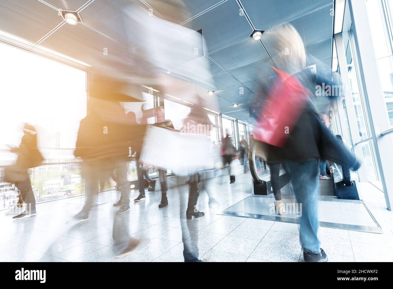 blurred people walking in a shopping mall Stock Photo - Alamy