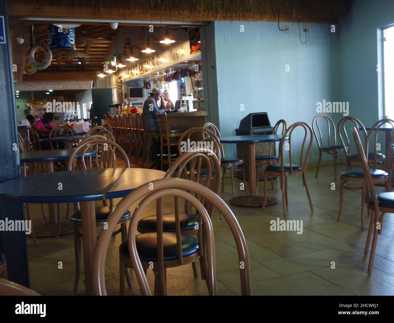 The tropical bar at St. Thomas ferry terminal Stock Photo - Alamy