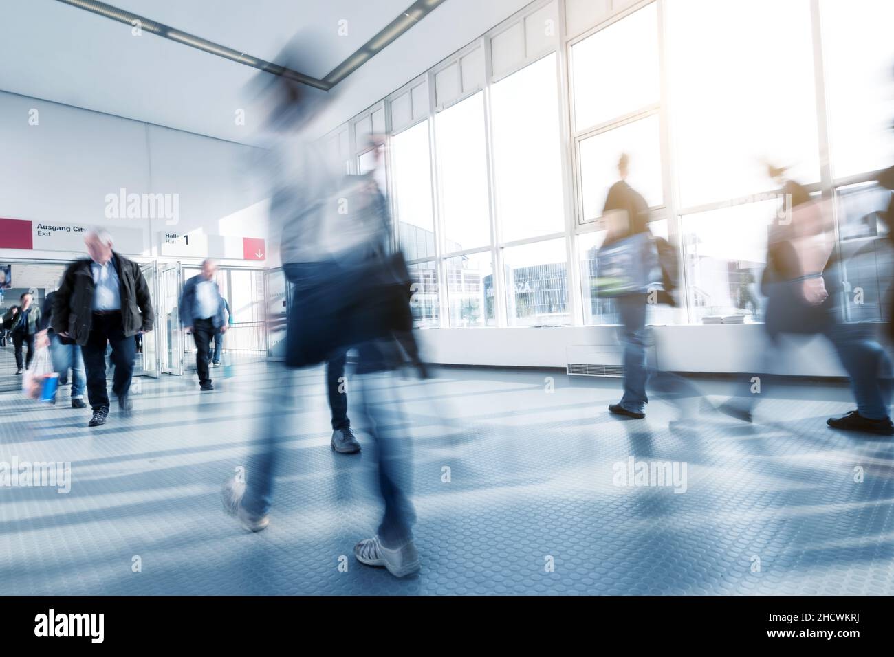 global Exhibition visitors at a modern walkway Stock Photo - Alamy