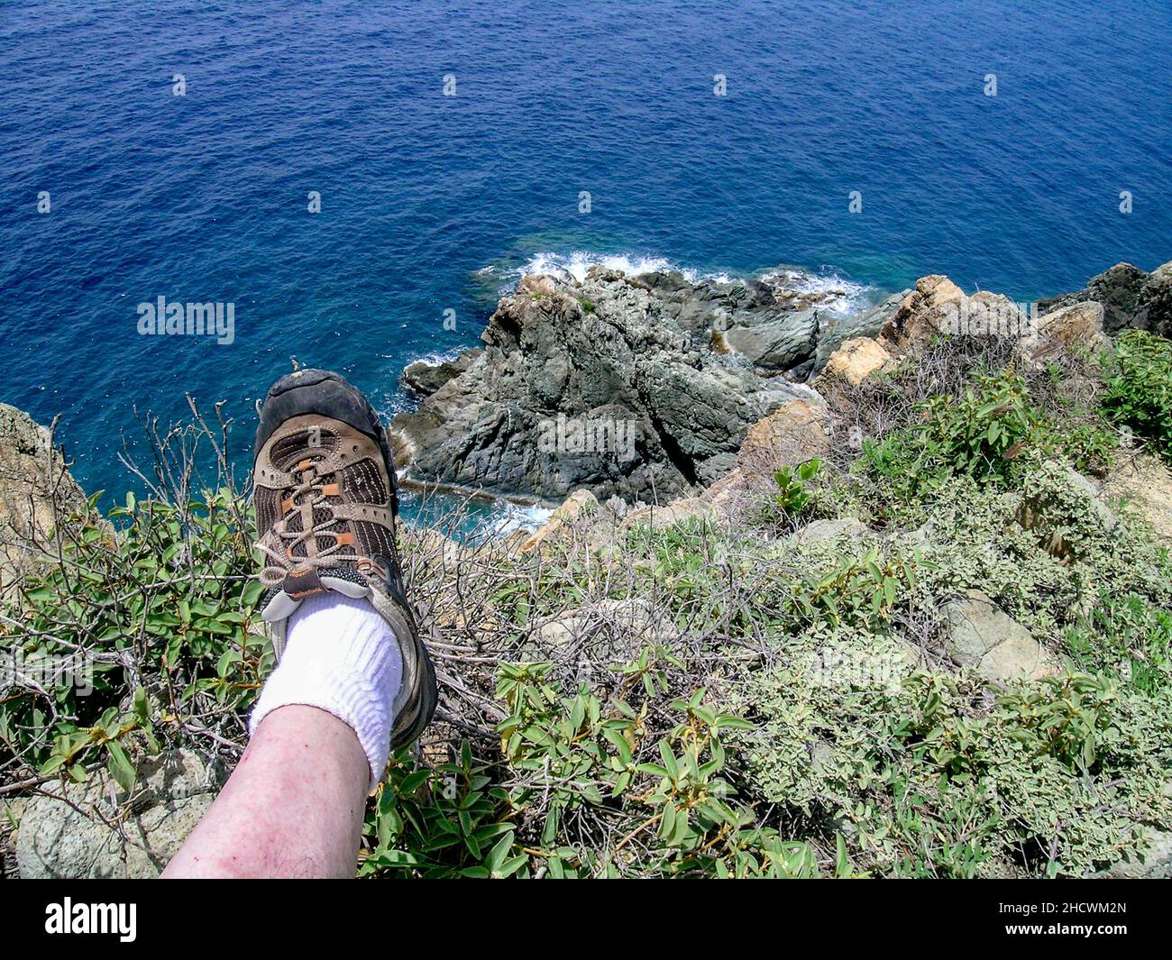 One misstep. POV of one person's left foot appears to extend over a ...