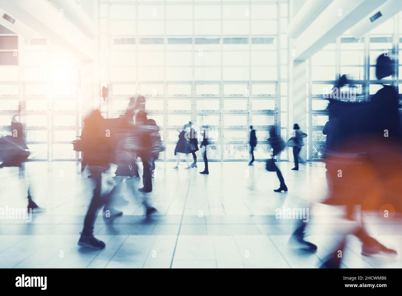 Crowd of people walking in a modern environment Stock Photo - Alamy