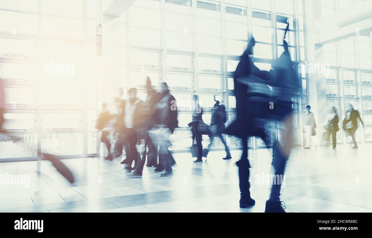 Crowd of people walking in a modern environment Stock Photo - Alamy