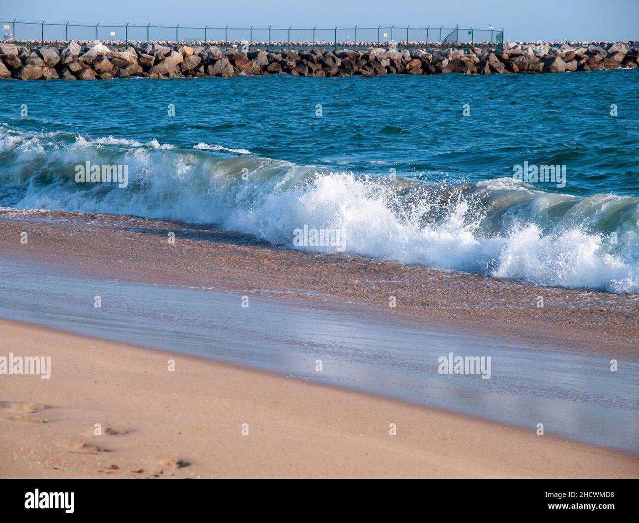 Ocean waves on beach Stock Photo - Alamy