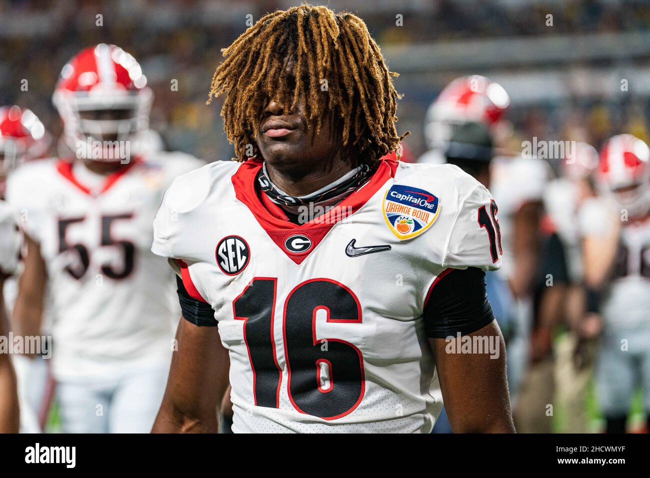 Georgia Bulldogs defensive back Lewis Cine (16) walks off the field ...