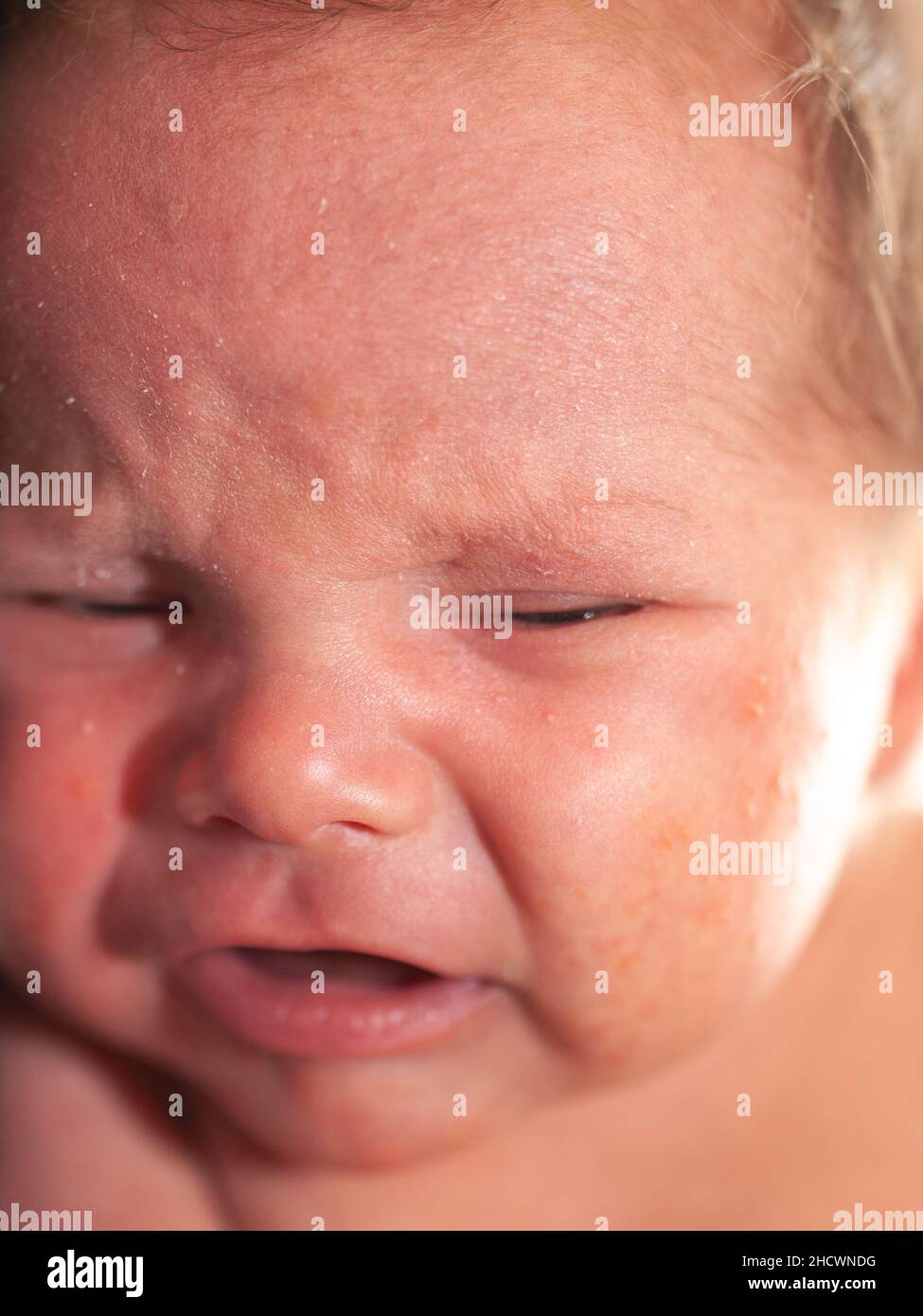 Crying, upset baby boy Stock Photo - Alamy