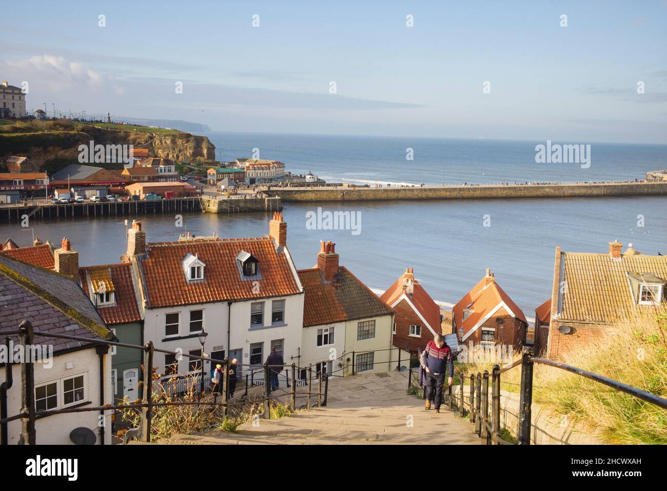 The steps leading up to the abbey and church at Whitby are steep and ...