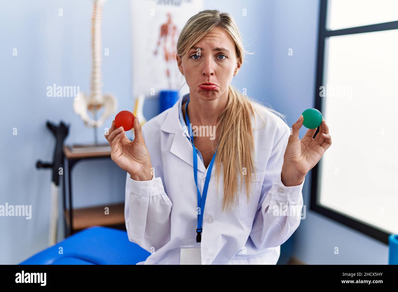 Beautiful woman holding strength ball for hand rehabilitation depressed ...