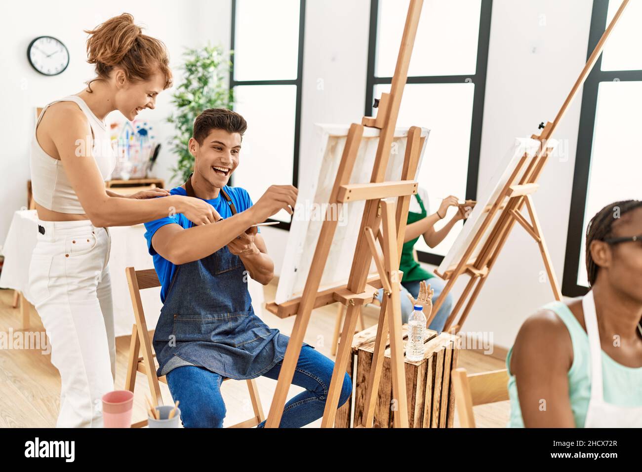 Group of people smiling happy drawing at art studio Stock Photo - Alamy