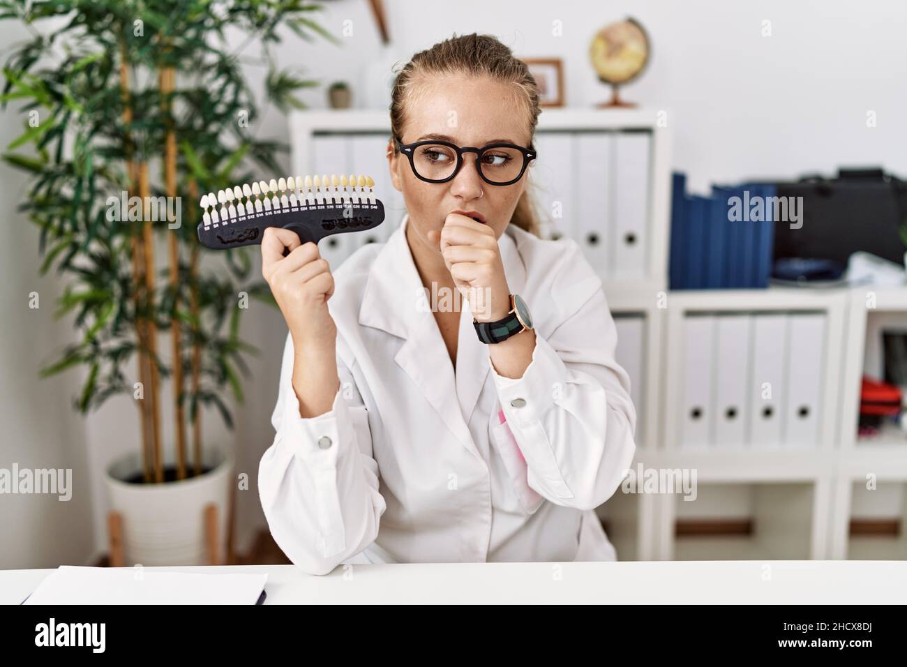 Woman comparing cold medicine hi-res stock photography and images - Alamy