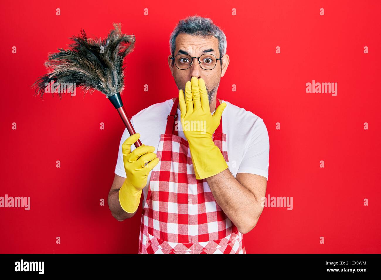 Man holding feather duster hi-res stock photography and images - Alamy
