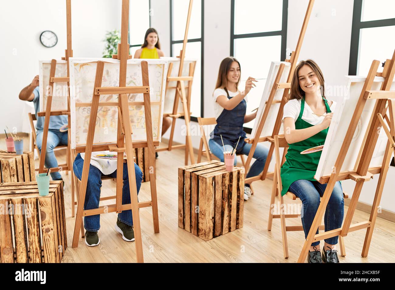 Group of people smiling happy drawing at art studio Stock Photo - Alamy