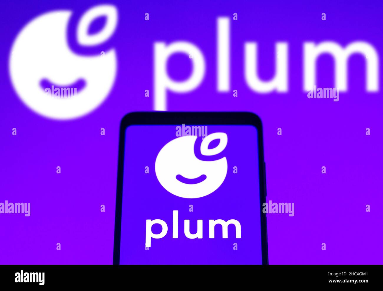 In this photo illustration, the Plum logo seen displayed on a ...