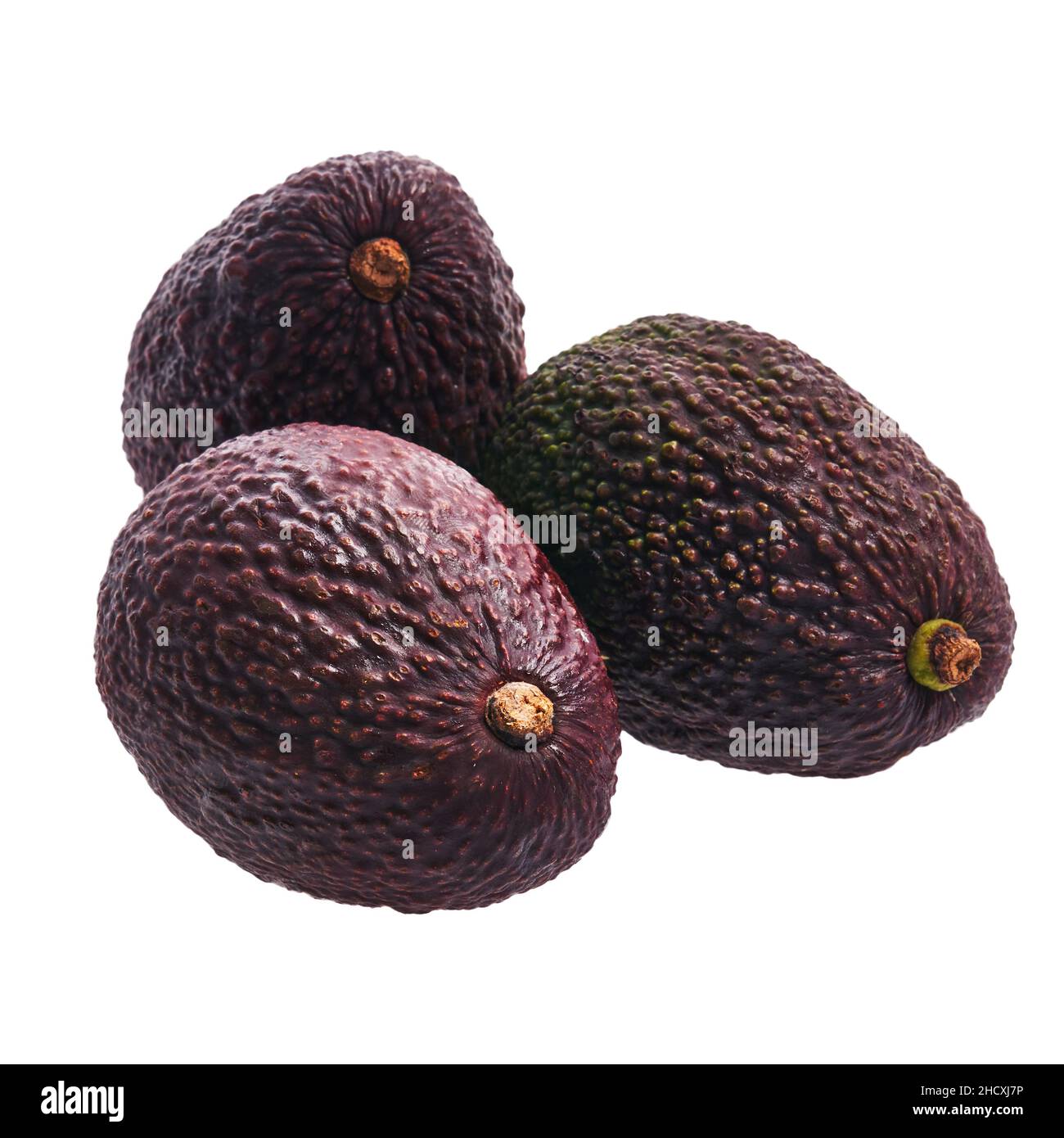 Three avocados fruit isolated over white background Stock Photo - Alamy