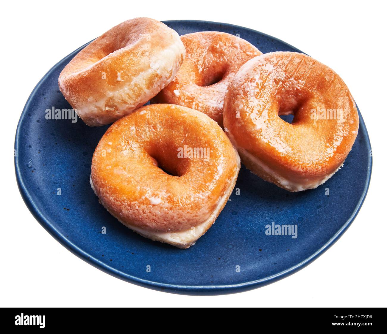 Plate of glazed doughnuts isolated over white background Stock Photo ...