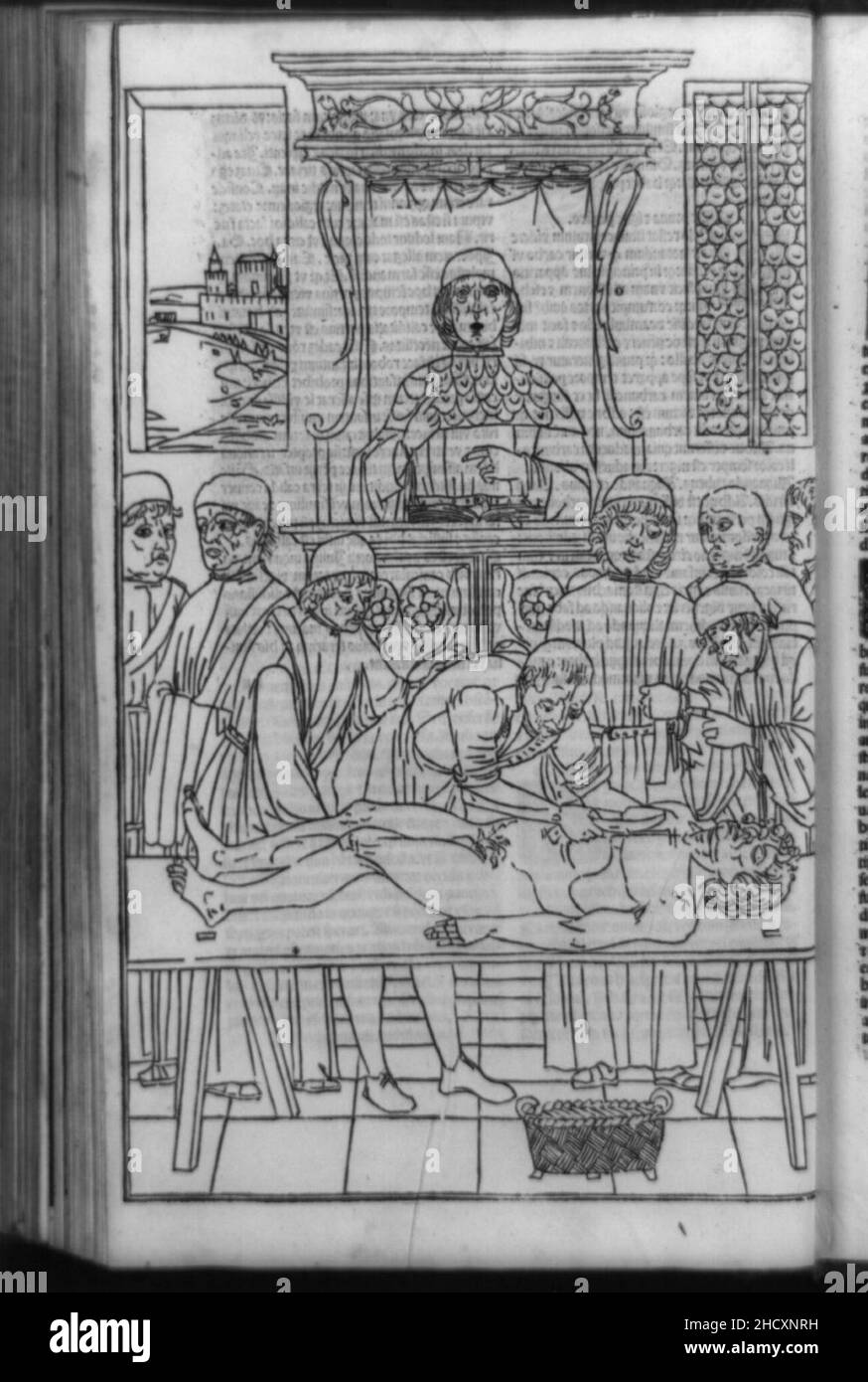 Remondino de Luzzi overseeing assistant in dissection of cadaver as ...