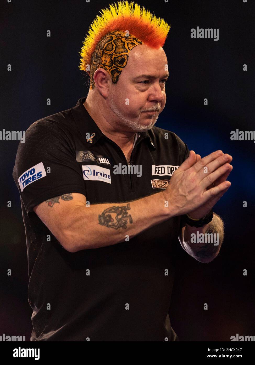 Peter Wright celebrates beating Callan Rydz (not in picture) during day ...