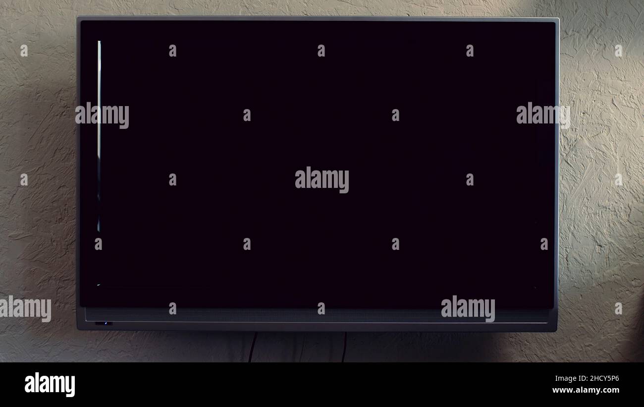 TV screen on wall. Led tv on the wall background with blank television ...