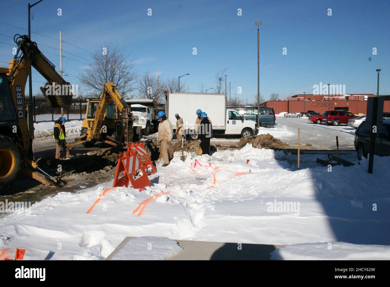 Repairing a broken water main 090116 Stock Photo - Alamy