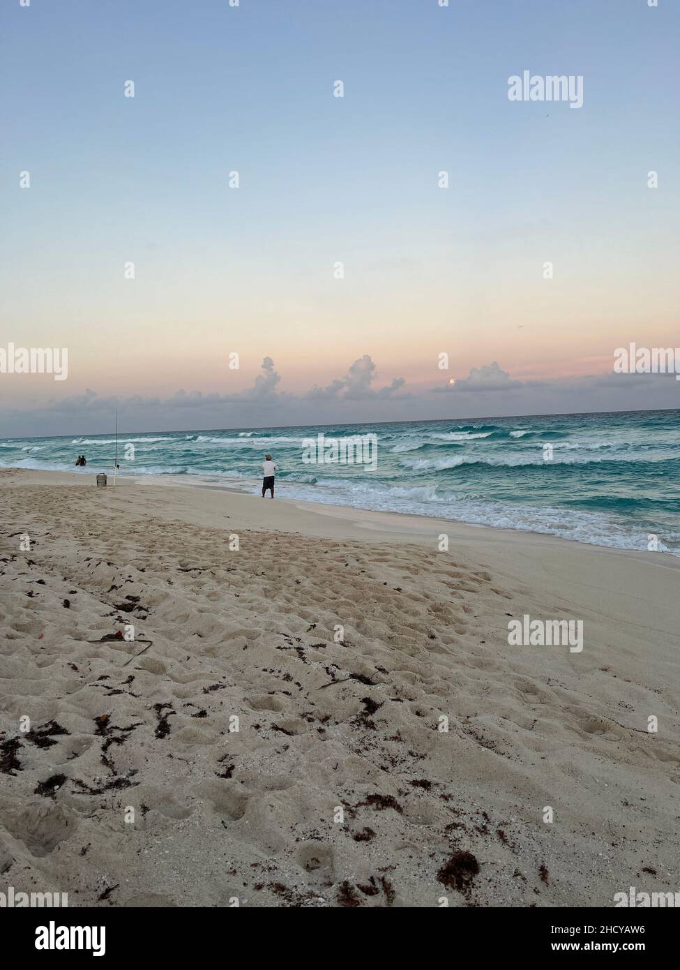Local fisherman fishing on Cancun beach in Mexico. Fishing at the ...