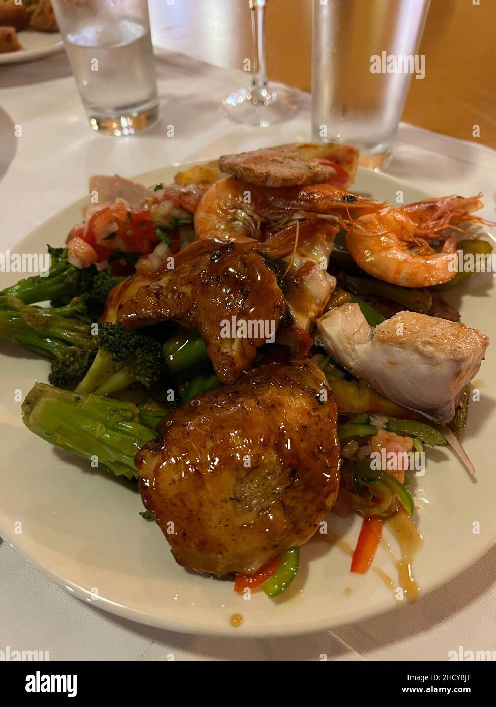 Big mixed seafood chicken dish close up. Surf and turf with chicken ...