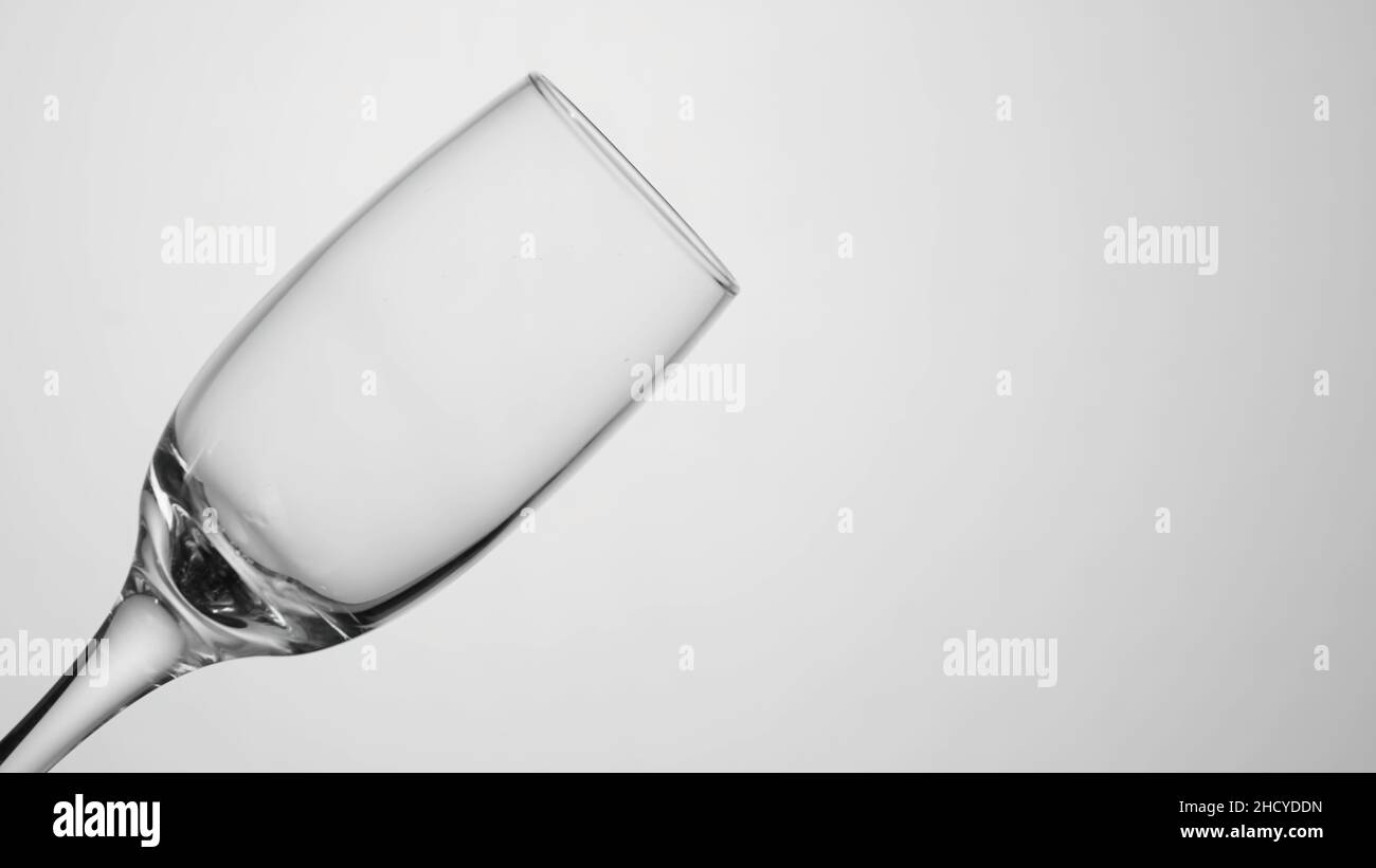 Transparent glass cup on isolated background. Action. Empty transparent ...