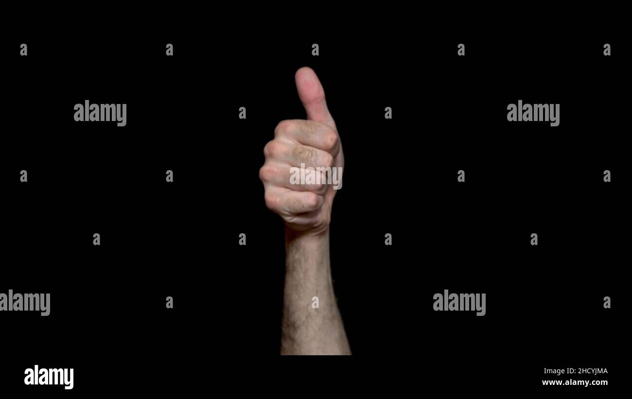 Male hand shows good job sign, thumbs up for agreement, success ...