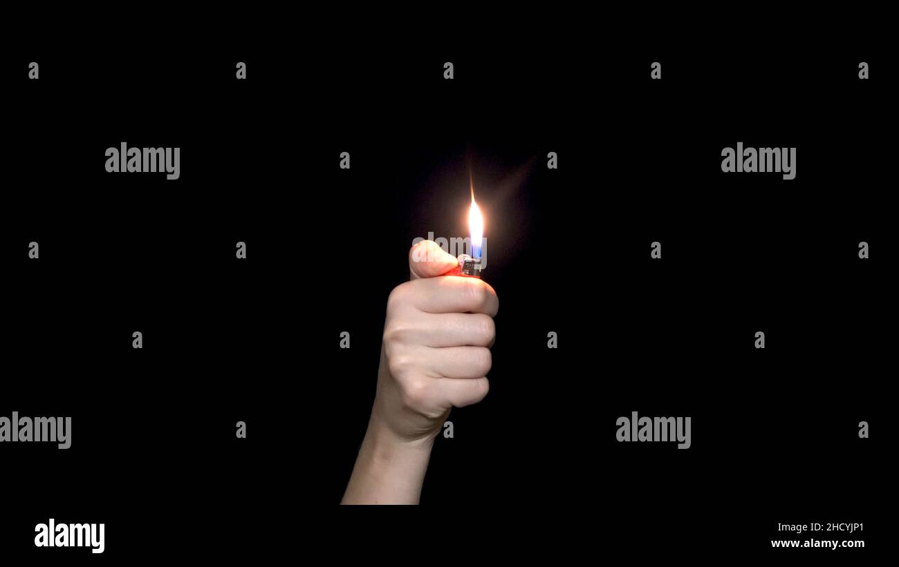 Male hand holding a red lighter, isolated on white background. Hand ...