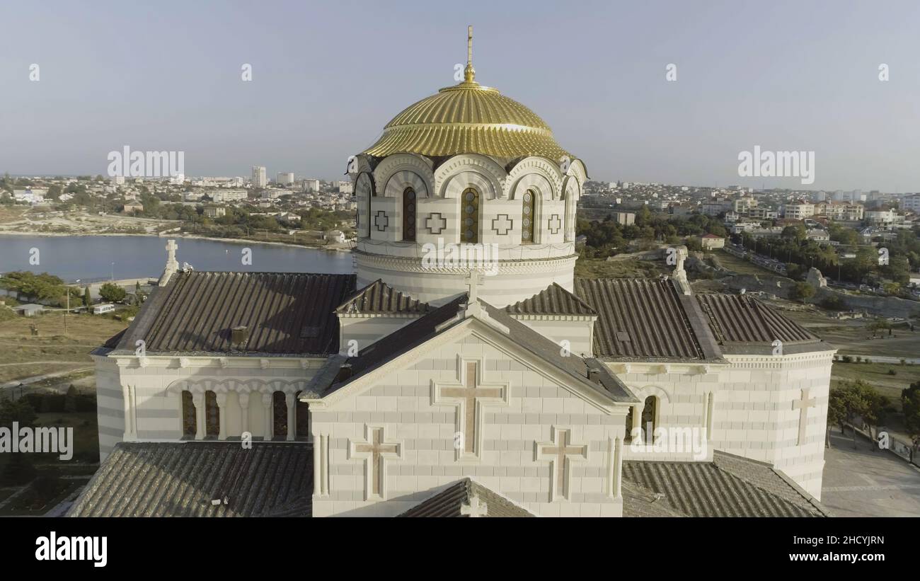 View of the big white church with golden domes in front of beautiful ...