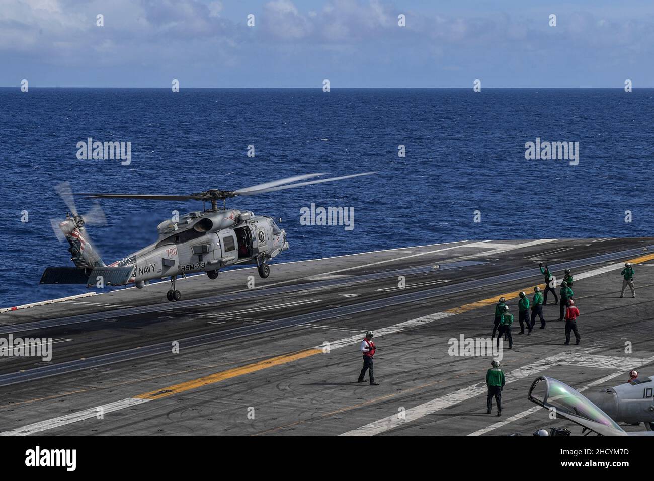 211231-N-YN807-1162 PHILIPPINE SEA (Dec. 31, 2021) An MH-60R Sea Hawk ...