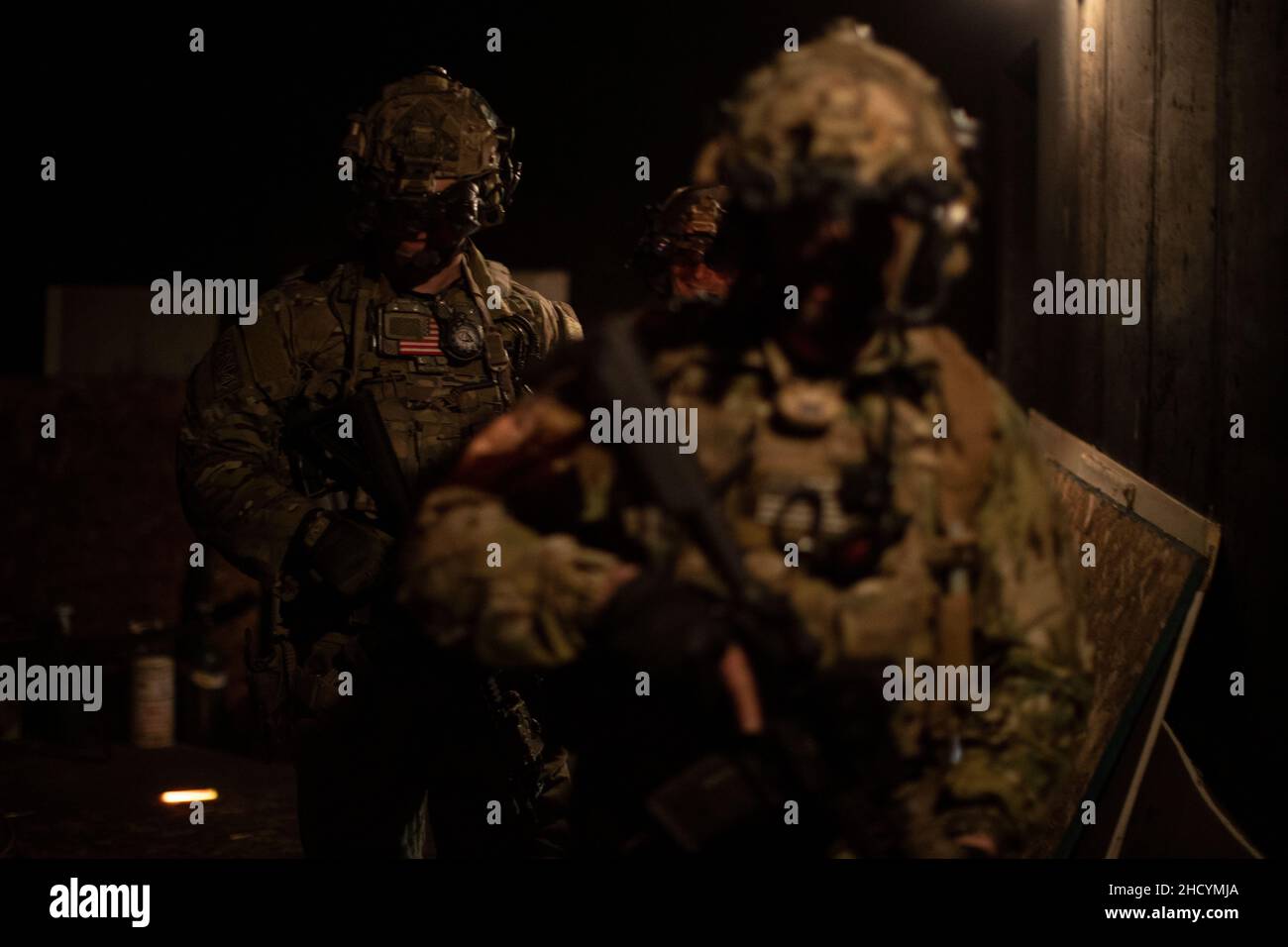 U.S. Army Special Forces (USSF) raid a mock hostile compound under the ...