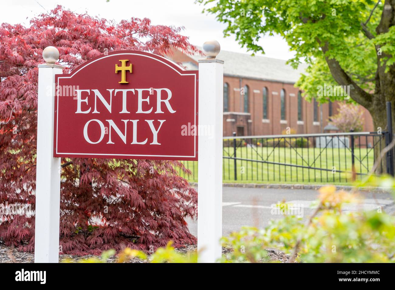 Generic Enter Only sign on church parking lot directing car traffic for ...