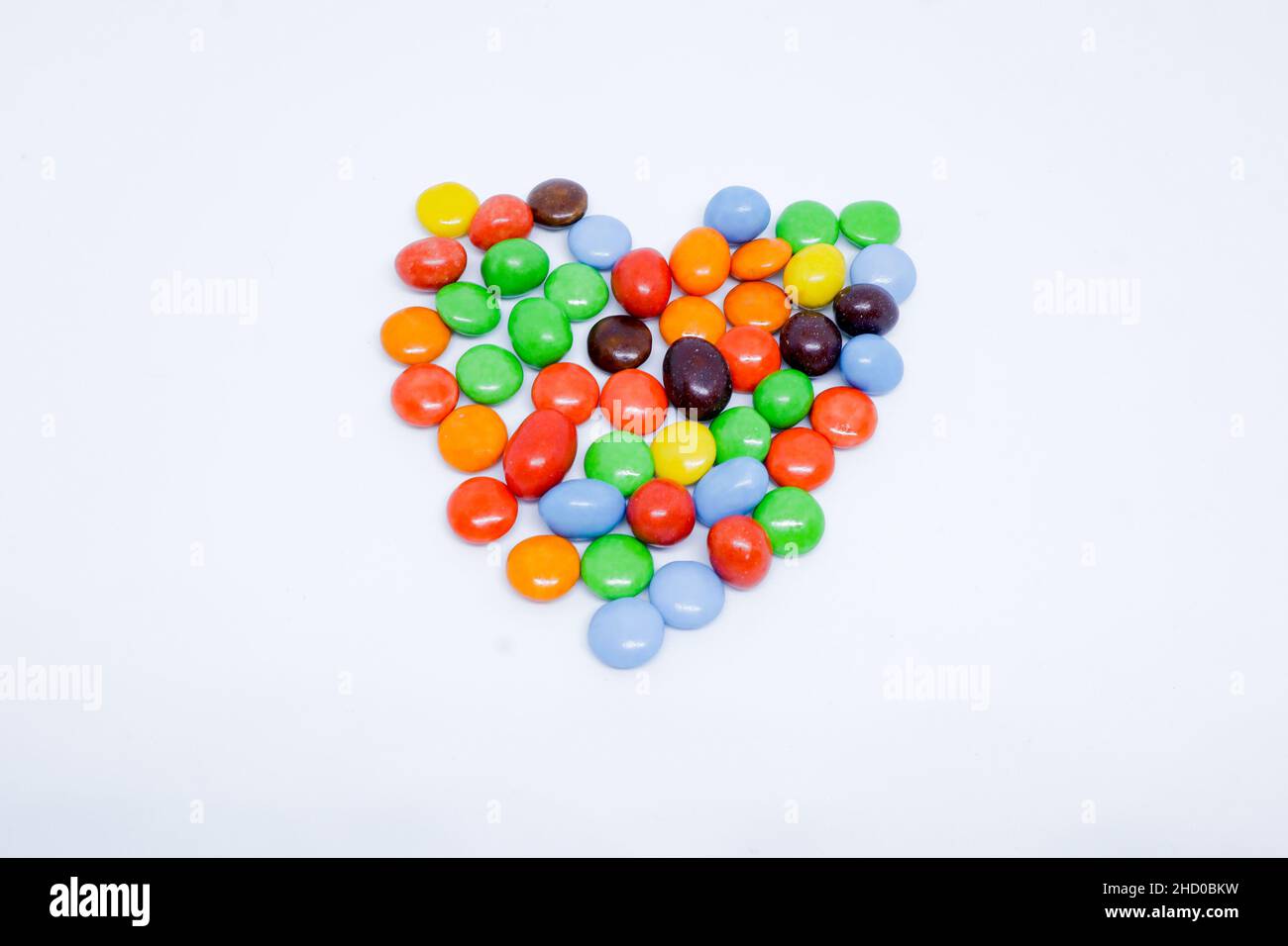 Colorful Candies with Love Shape in The White Background with Flat Lay ...