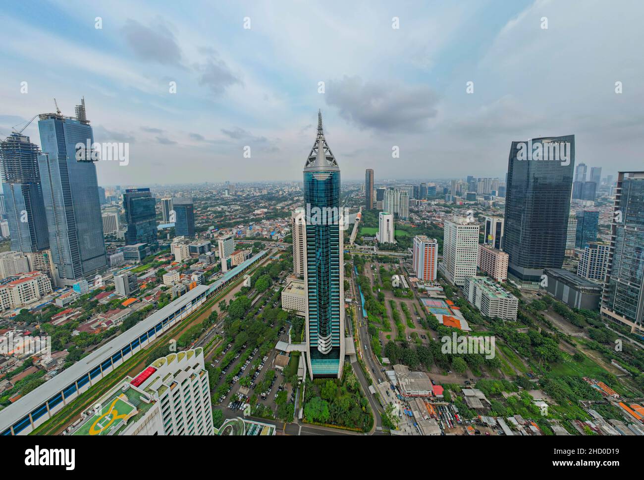 Aerial view of BNI 46 building in Jakarta and noise cloud with ...