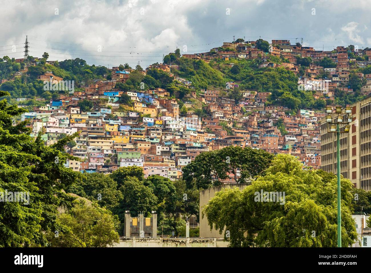 Urban residential buildings on hill in Caracas Venezuela capital at day ...