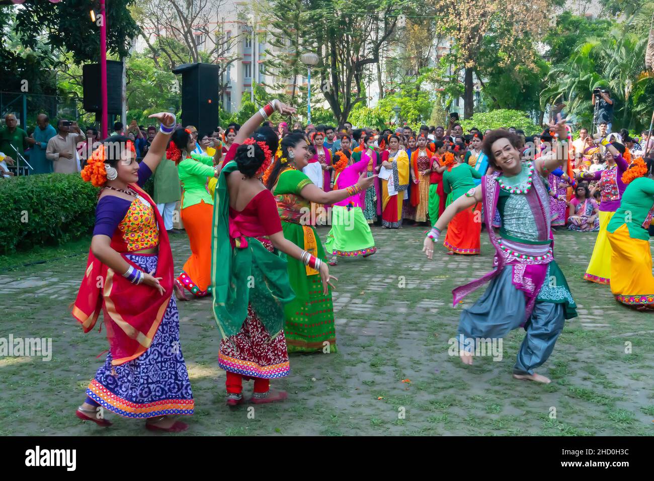 Kolkata,India- 21st March 2019: Girls dancing,dressed in colourful sari ...