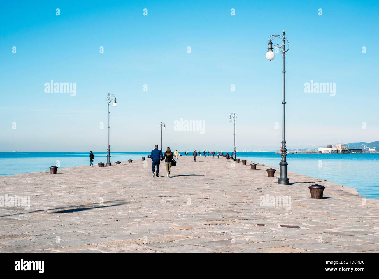 many people walking at famous Audace Pier in Trieste city, Italy Stock ...