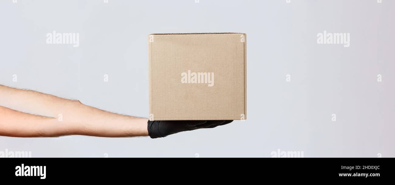 Contactless delivering, covid-19 and shopping concept. Image of courier ...