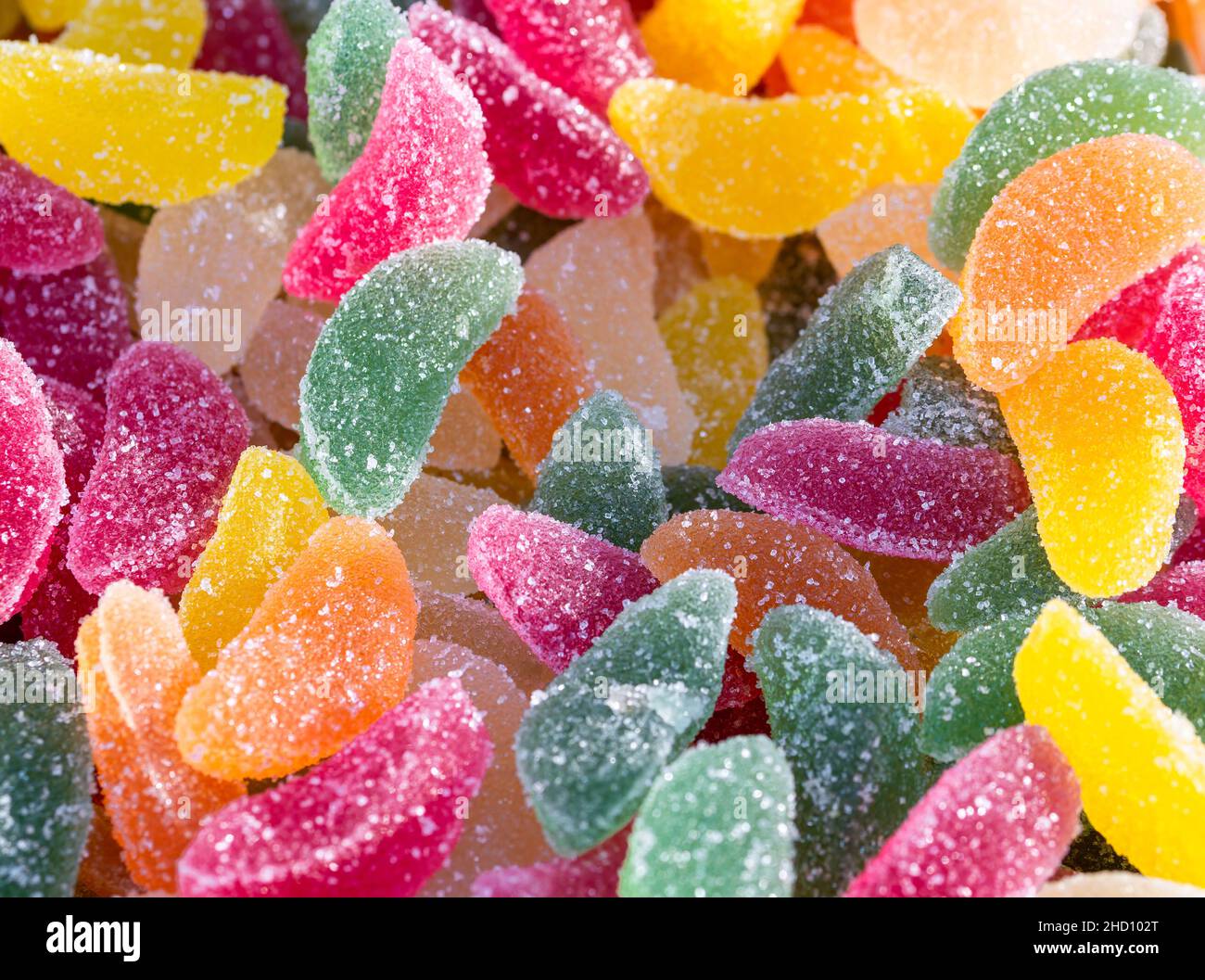 Many colorful jelly beans sweets background. Gumdrops candies with ...