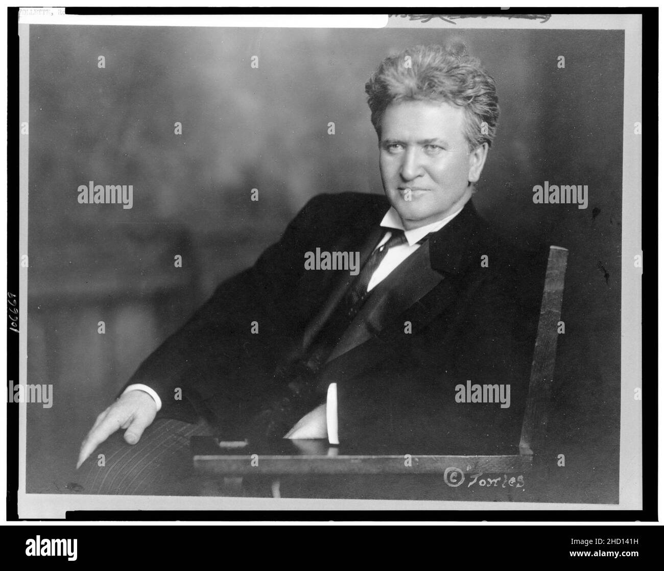 Robert La Follette, half-length portrait, seated, facing left Stock ...